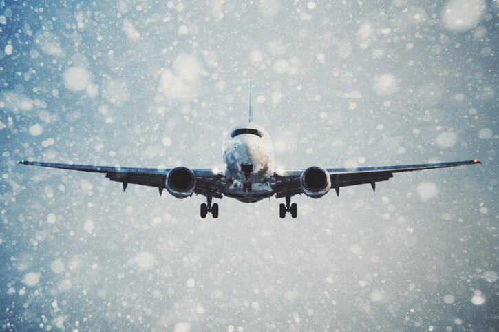 Snow On The Runway With Airplane
